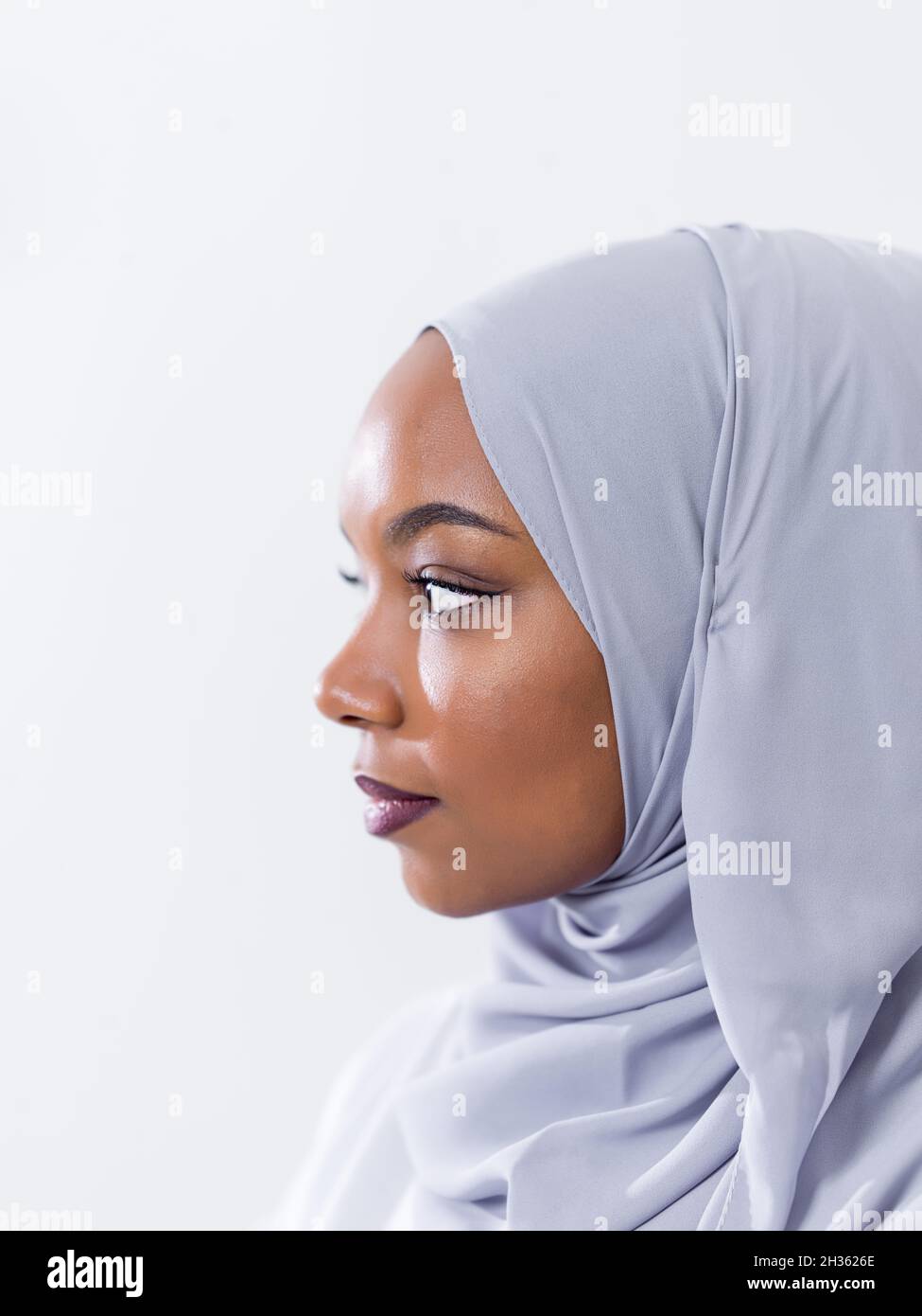 portrait of young modern muslim afro beauty wearing traditional islamic ...
