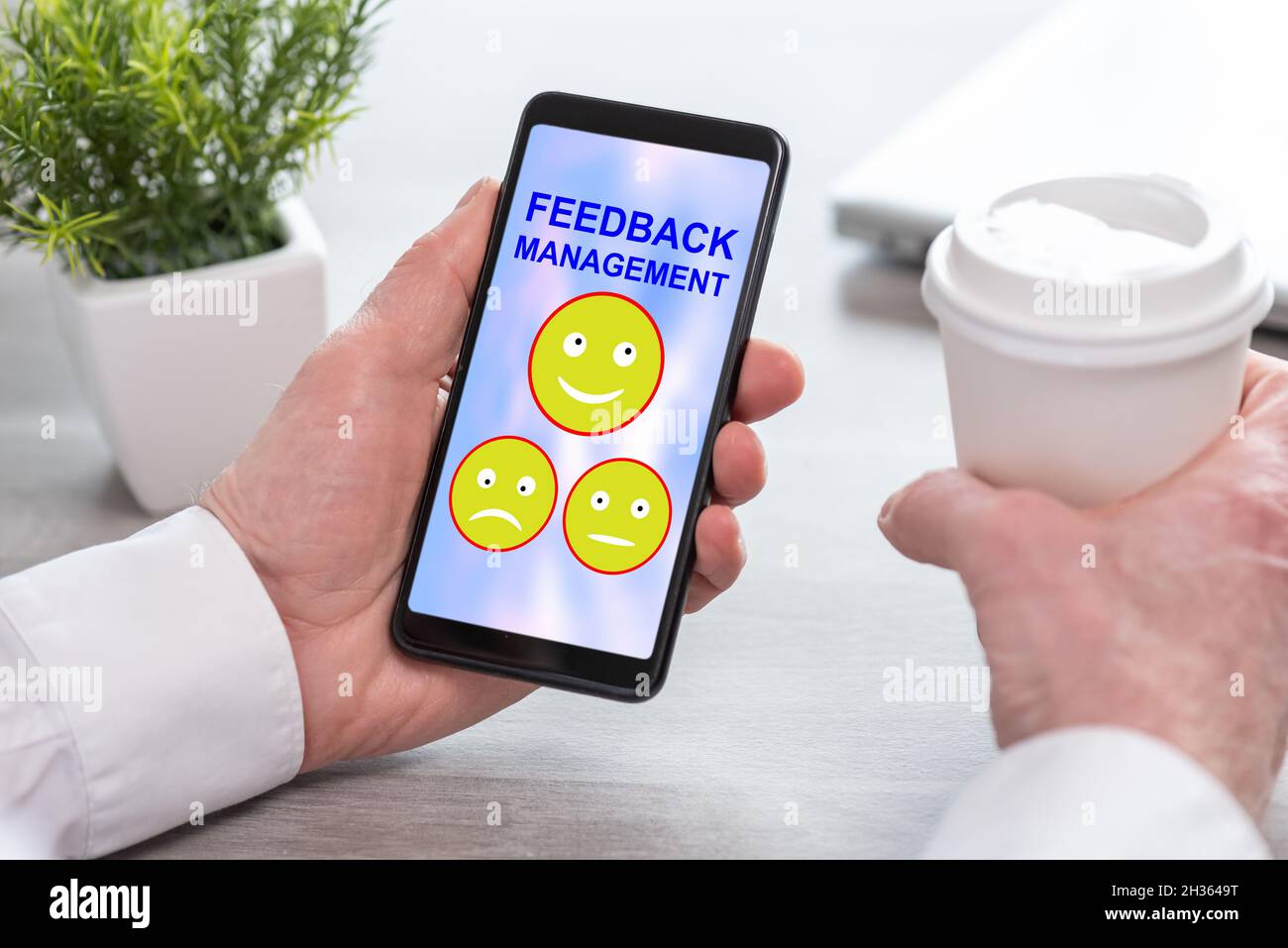 Smartphone screen displaying a feedback management concept Stock Photo ...
