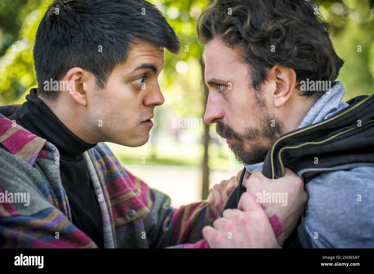 Two very angry, nervous and upset men in an aggressive and fierce ...