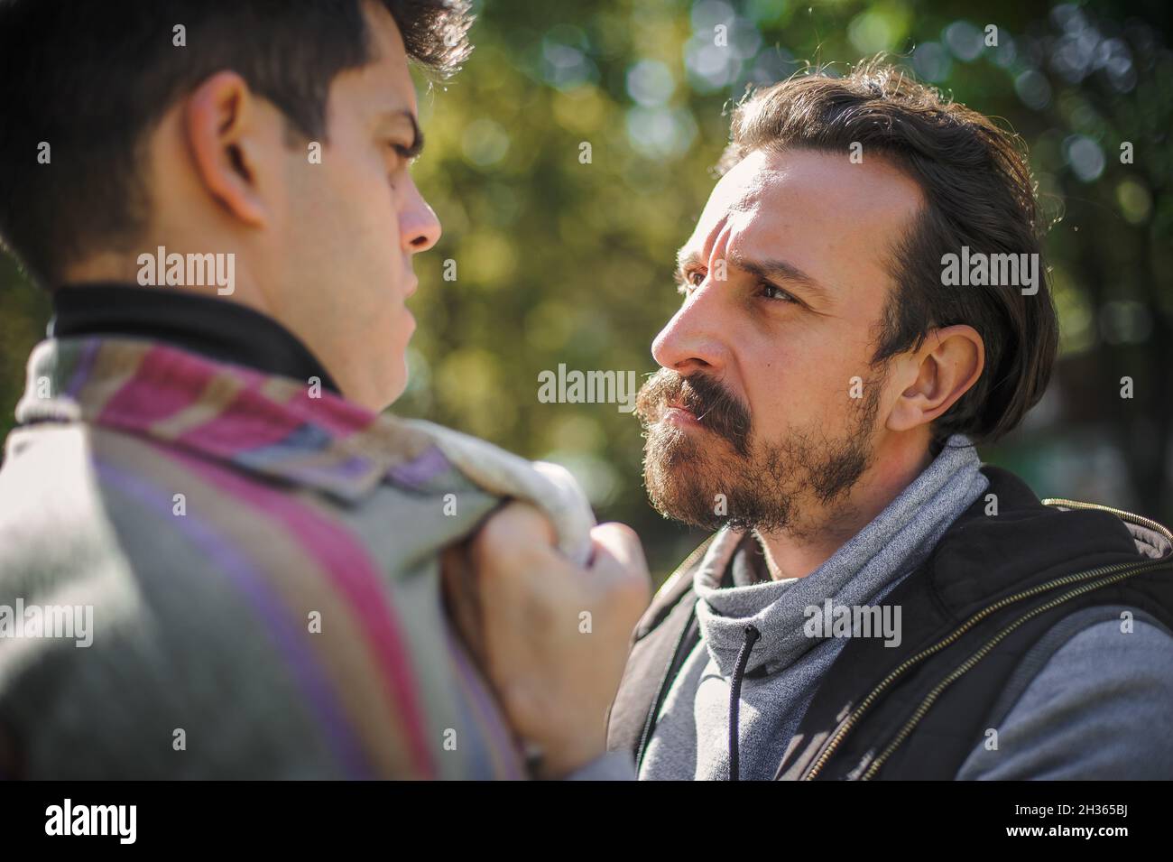 Two very angry, nervous and upset men in an aggressive and fierce ...