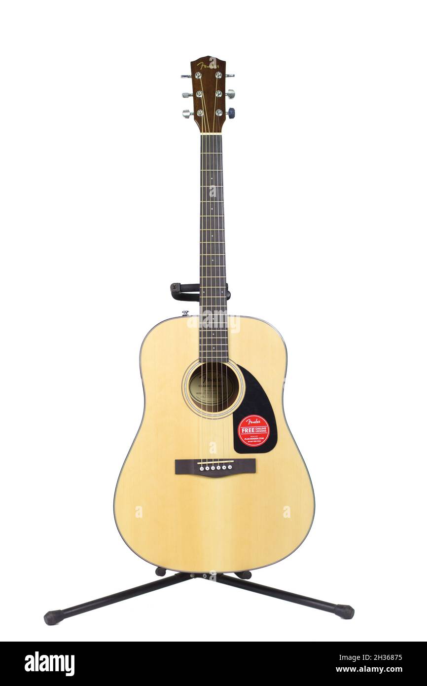 new guitar on a white background, electro and acoustics Stock Photo - Alamy