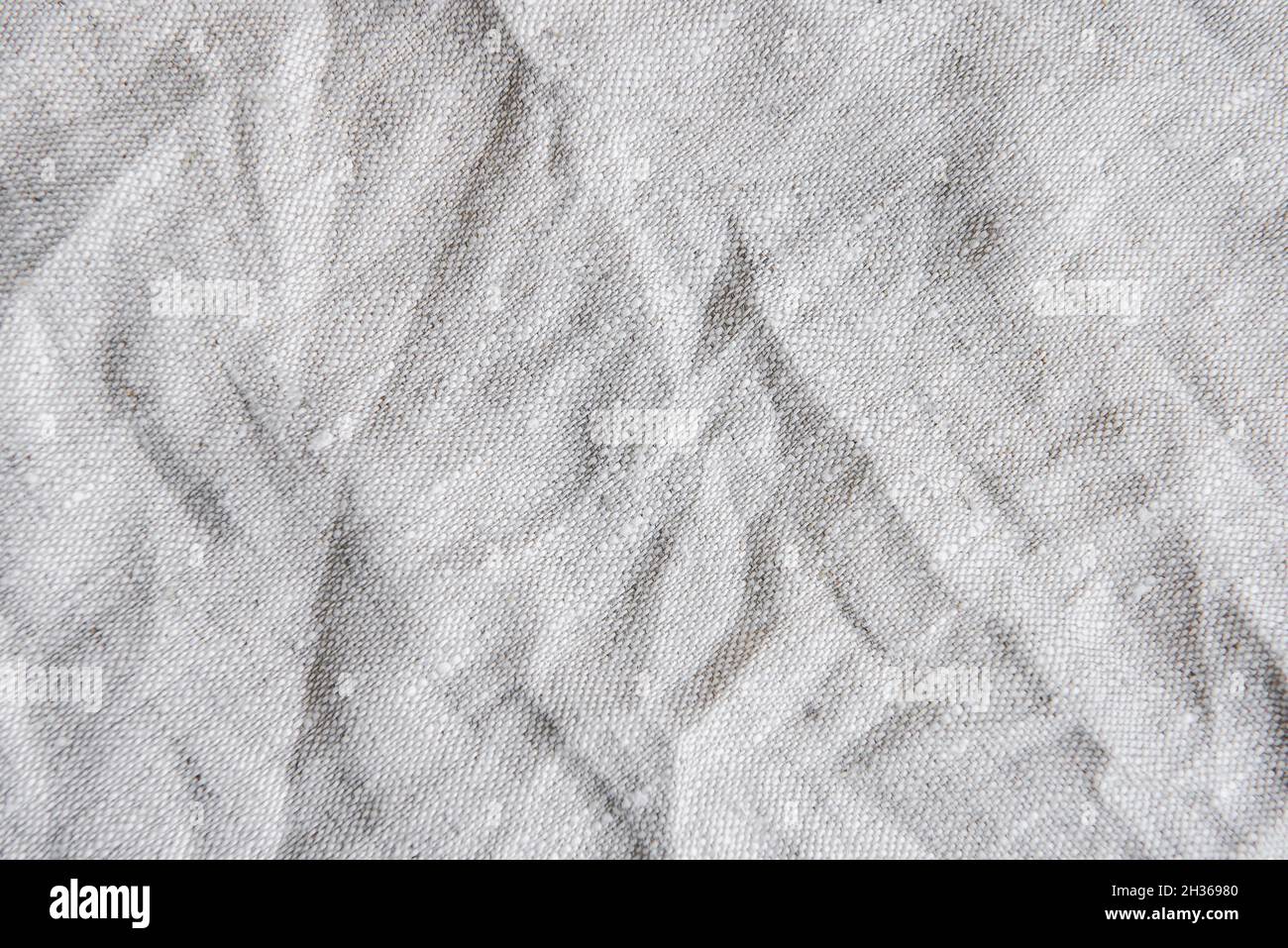 Gray textile linen tablecloth in full frame. Cloth texture background ...