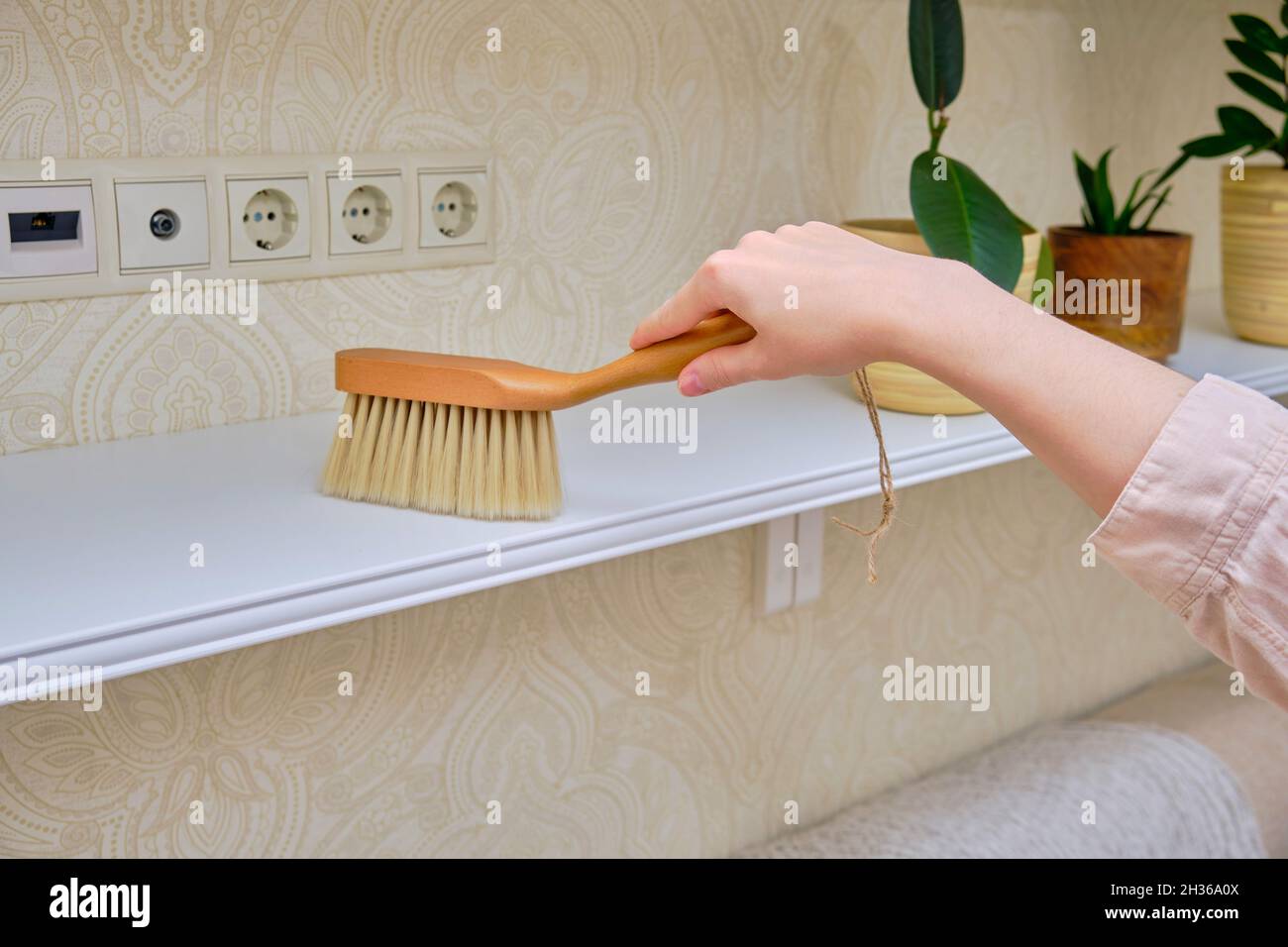 Brushing dust hi-res stock photography and images - Alamy
