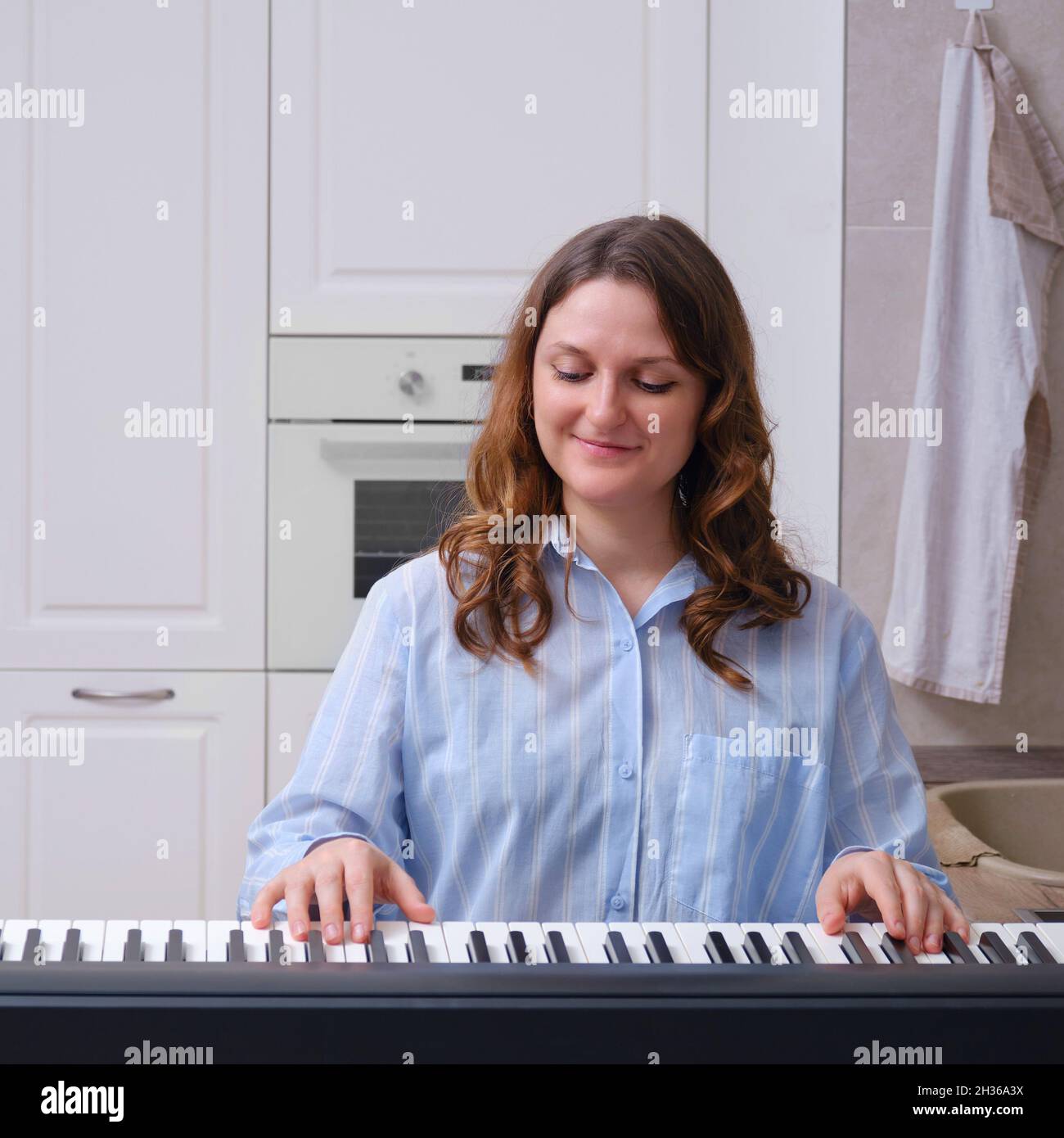 Woman white nightgown kitchen hi-res stock photography and images - Alamy