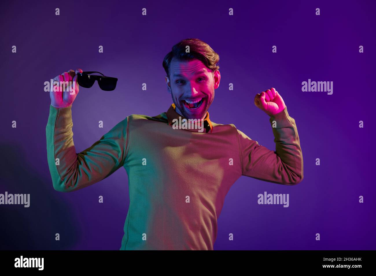 Photo of young man happy positive smile have fun dance party nightclub ...