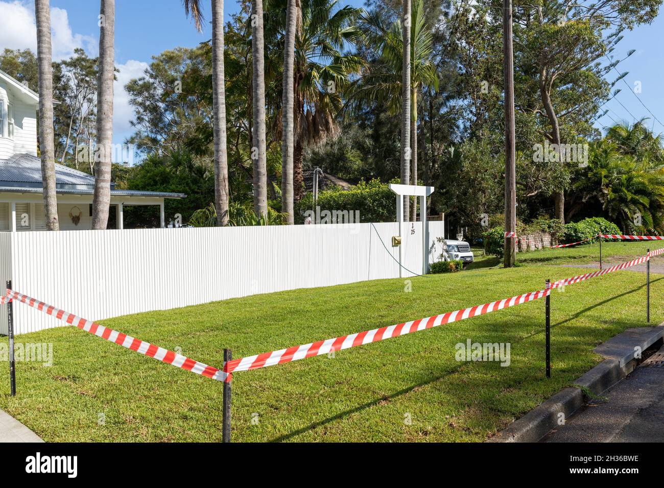 Freshly laid buffalo turf lawn outside a home in Avalon Beach protected ...