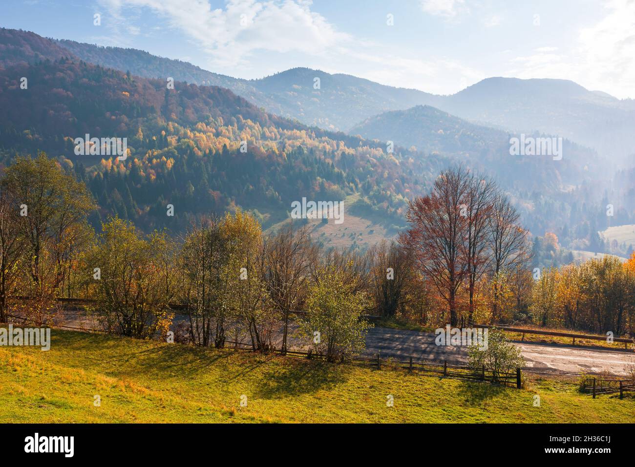 autumnal landscape in mountains. beautiful foggy morning. forests in ...