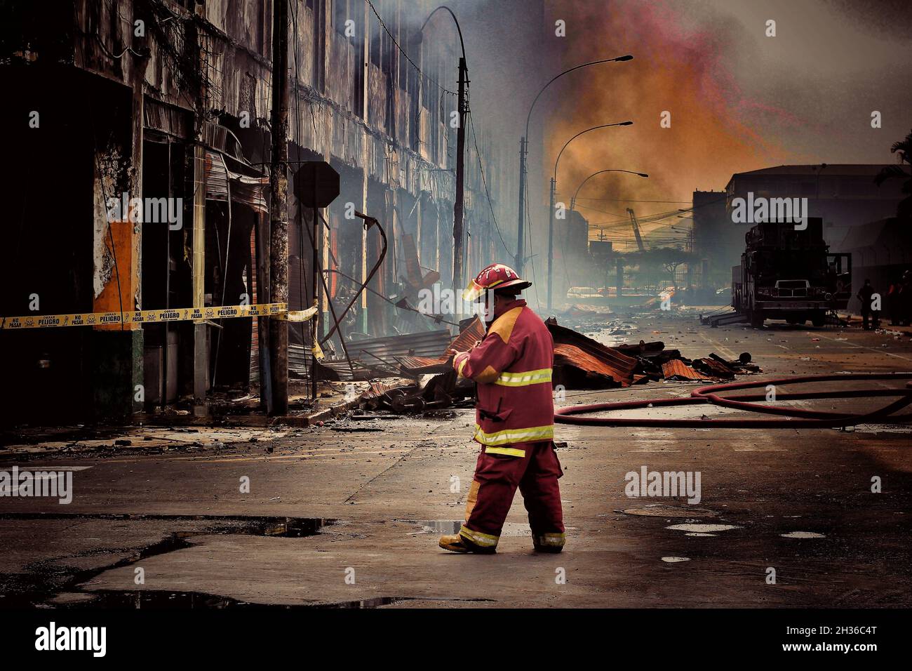 Closeup of a firefighter during service on the streets of a city with ...