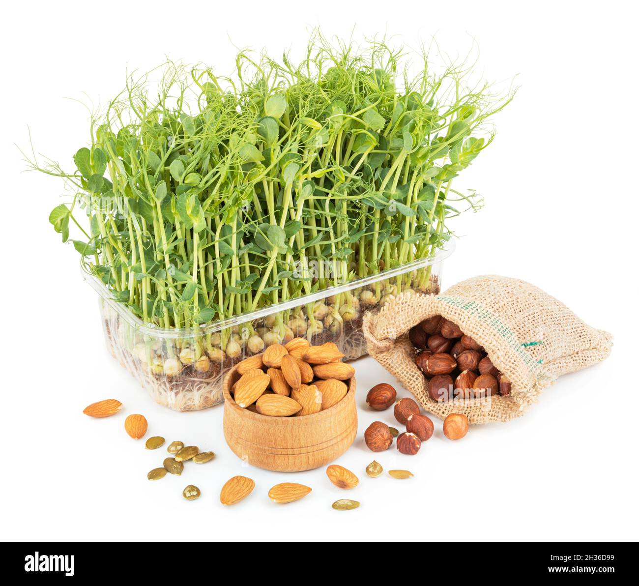 Healthy vegan breakfast with microgreens and various nuts Stock Photo ...
