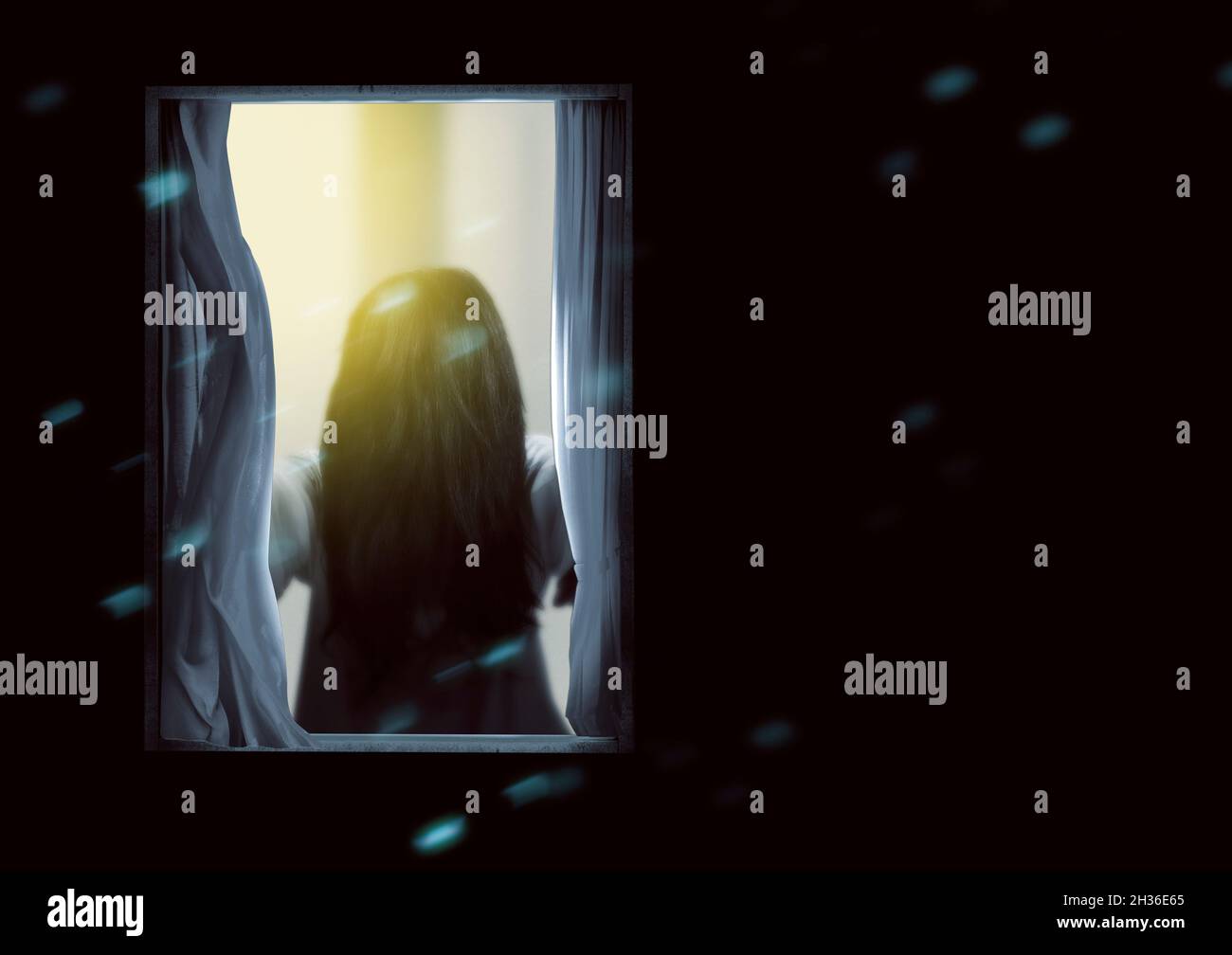 Scary ghost woman standing on the window. Halloween concept Stock Photo ...