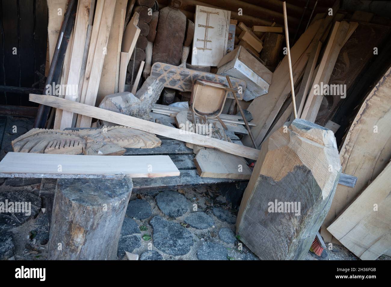 Boards and wood in a carpentry workshop outside. Timber wood blanks at ...