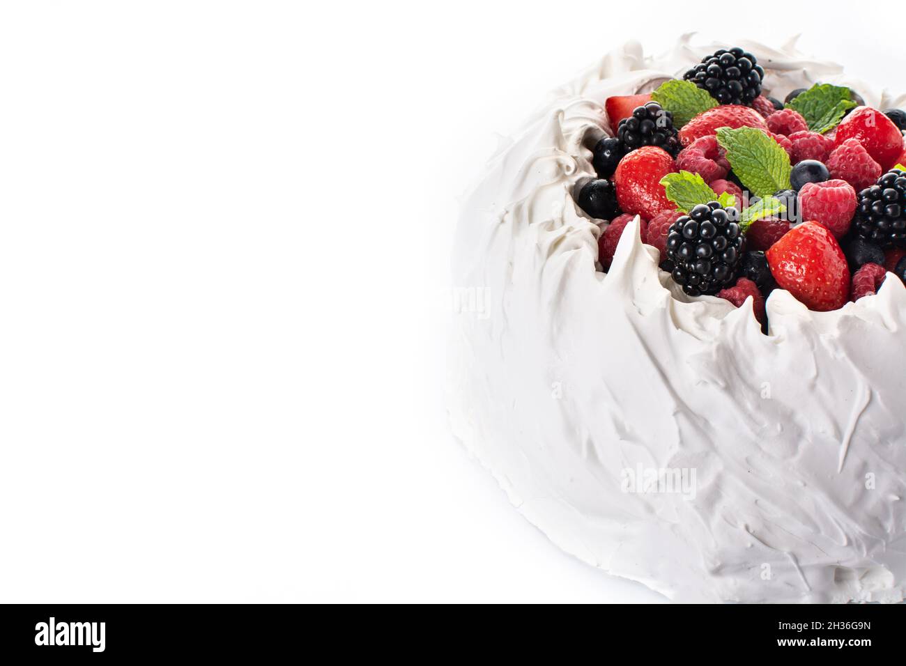 Delicious Pavlova cake with meringue and fresh berries on white ...