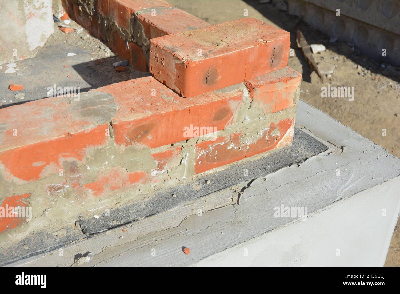 Close up on bitumen membrane for house foundation wall waterproofing ...
