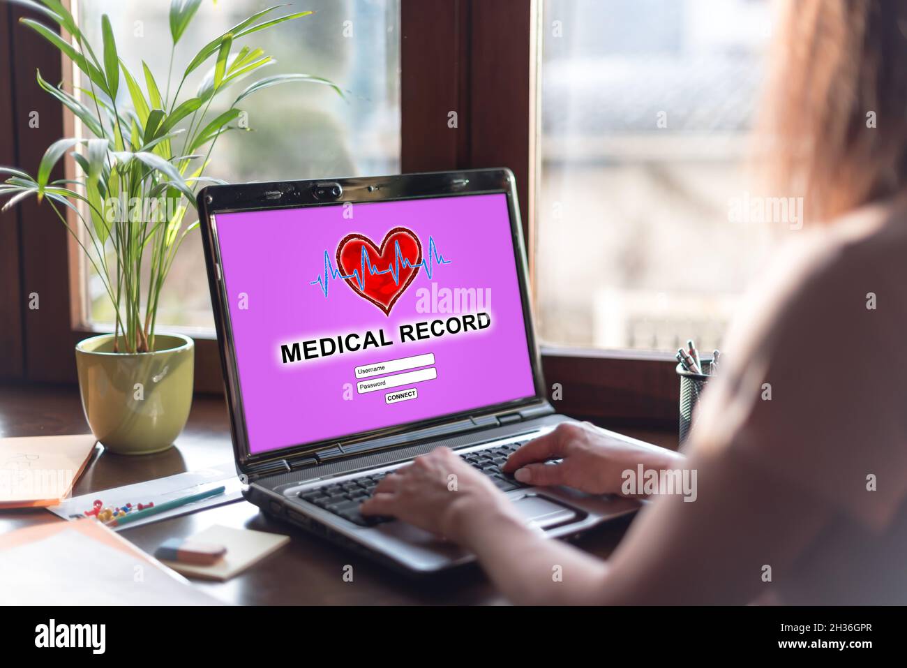 Laptop screen displaying a medical record concept Stock Photo - Alamy