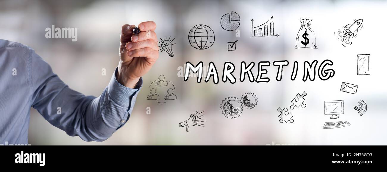 Man drawing a marketing concept Stock Photo - Alamy