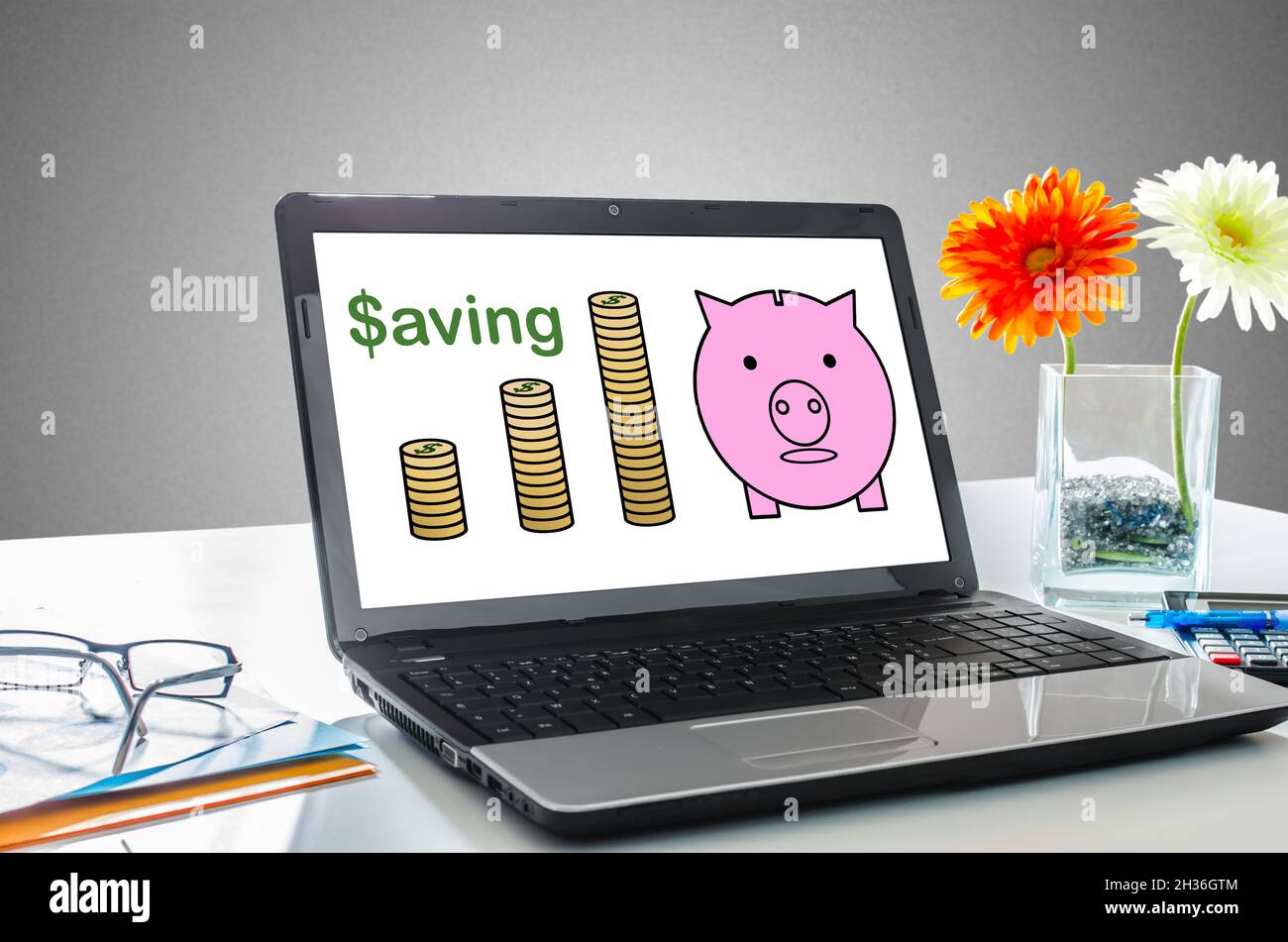 Laptop screen showing saving concept Stock Photo - Alamy