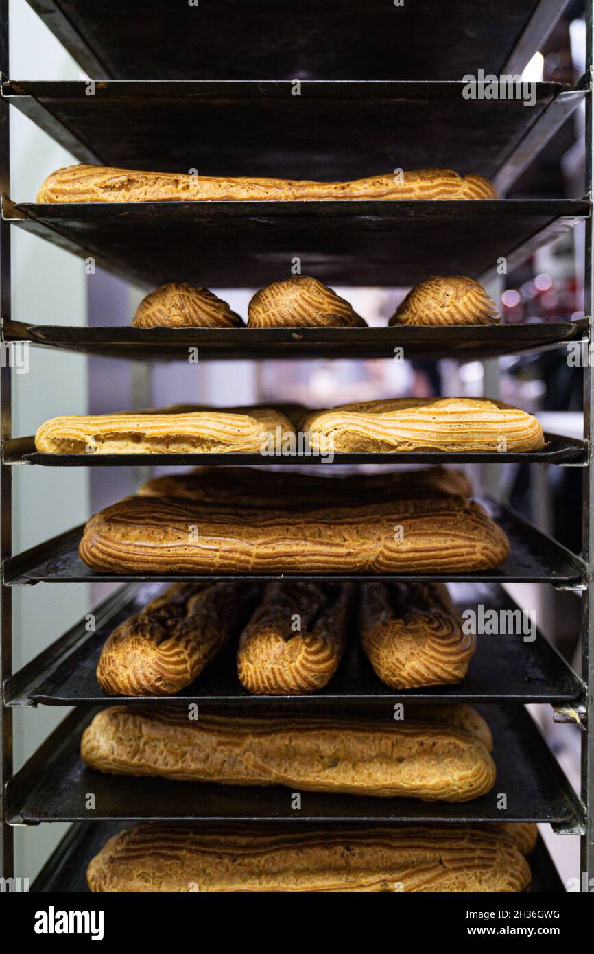 Bakery preparing and selling tasty pastries Stock Photo - Alamy