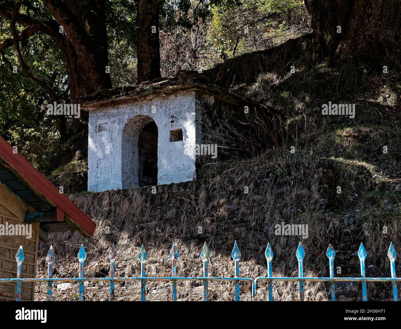 Traditional small Hindu shrine in stone Stock Photo - Alamy