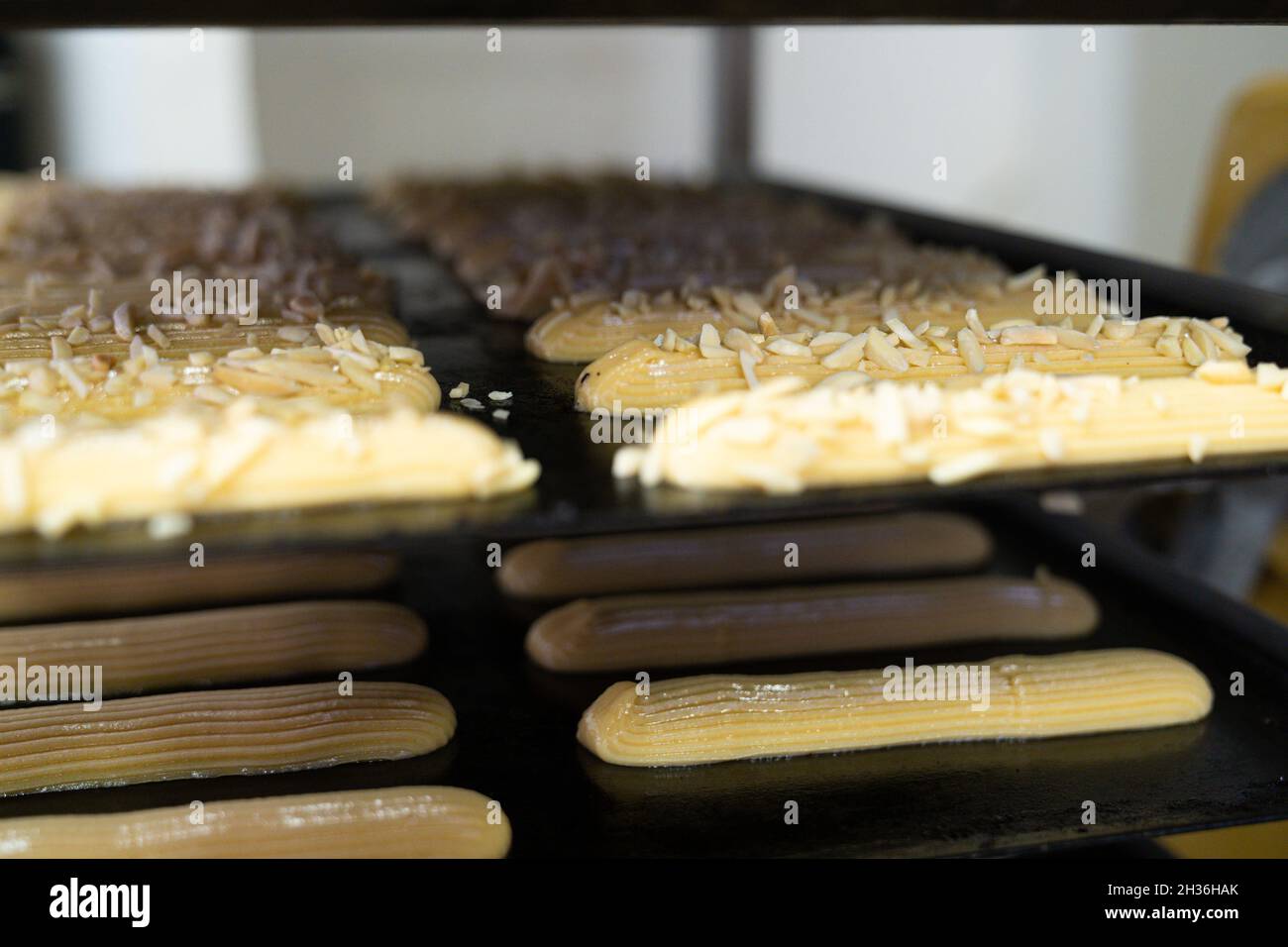 Bakery preparing and selling tasty French pastries Stock Photo - Alamy
