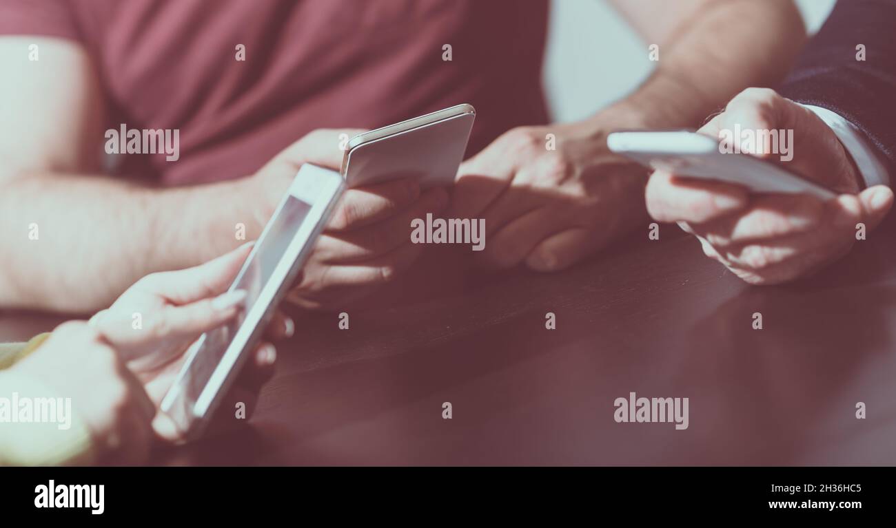 Many people cell phones hi-res stock photography and images - Alamy