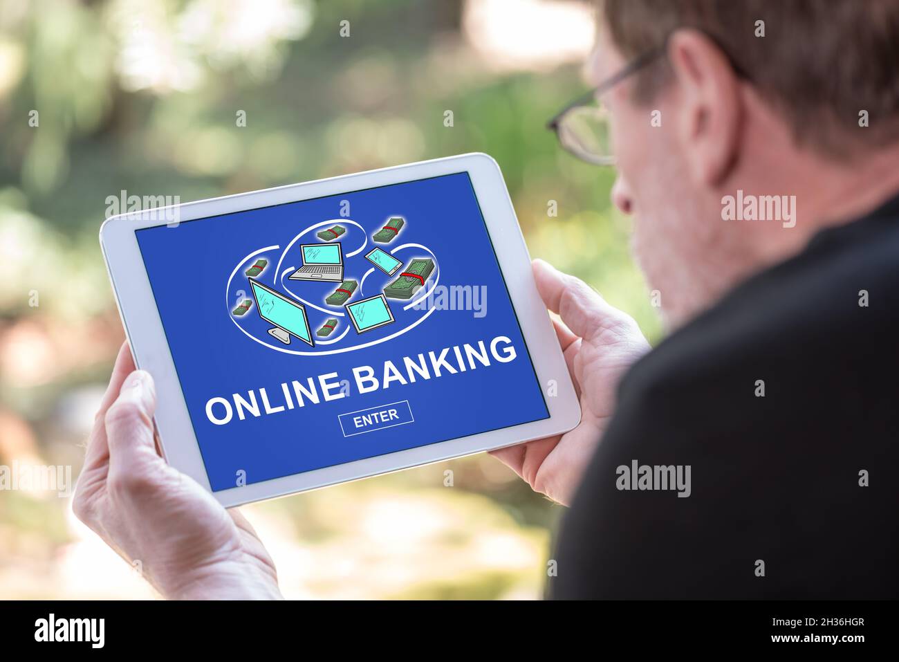 Tablet screen displaying an online banking concept Stock Photo - Alamy