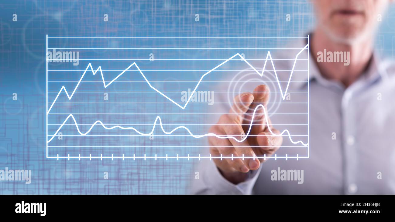 Man touching business charts on a touch screen with his finger Stock ...