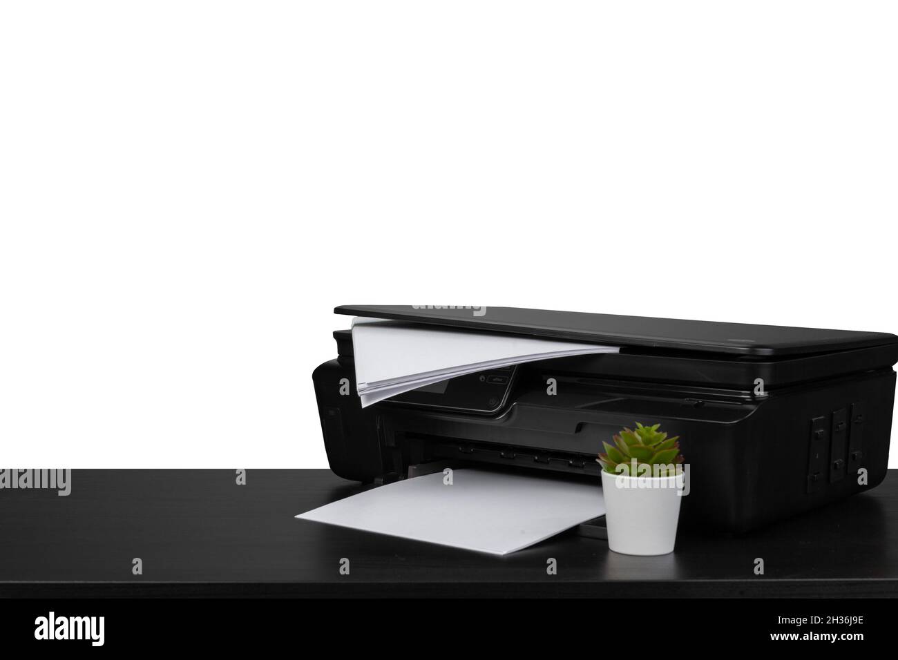 Laser home printer on table against white backgorund Stock Photo - Alamy