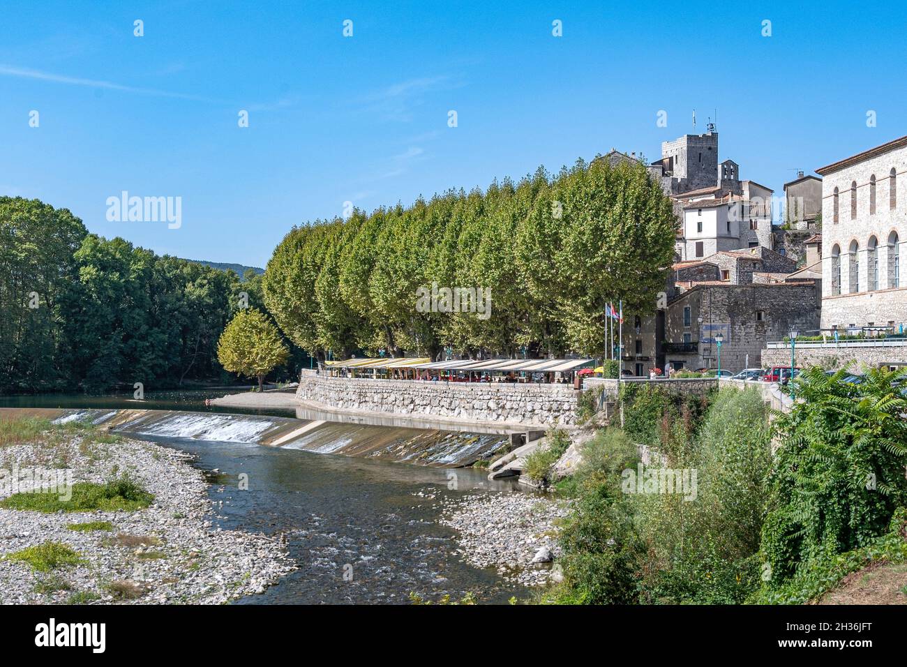 The Hérault river borders the quaint medieval village of Laroque in the ...