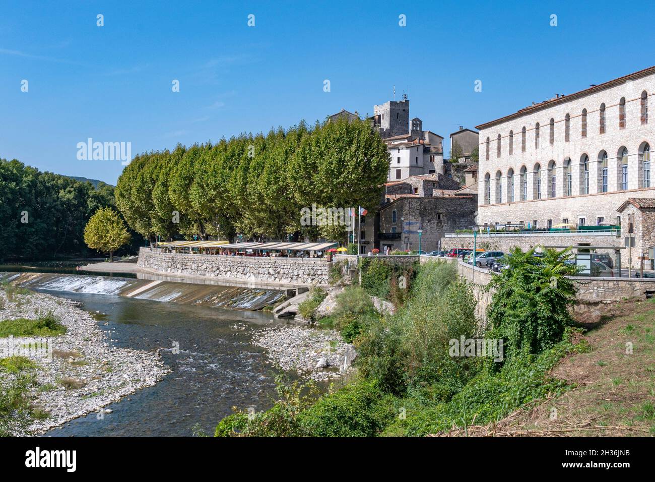 The Hérault river borders the quaint medieval village of Laroque in the ...