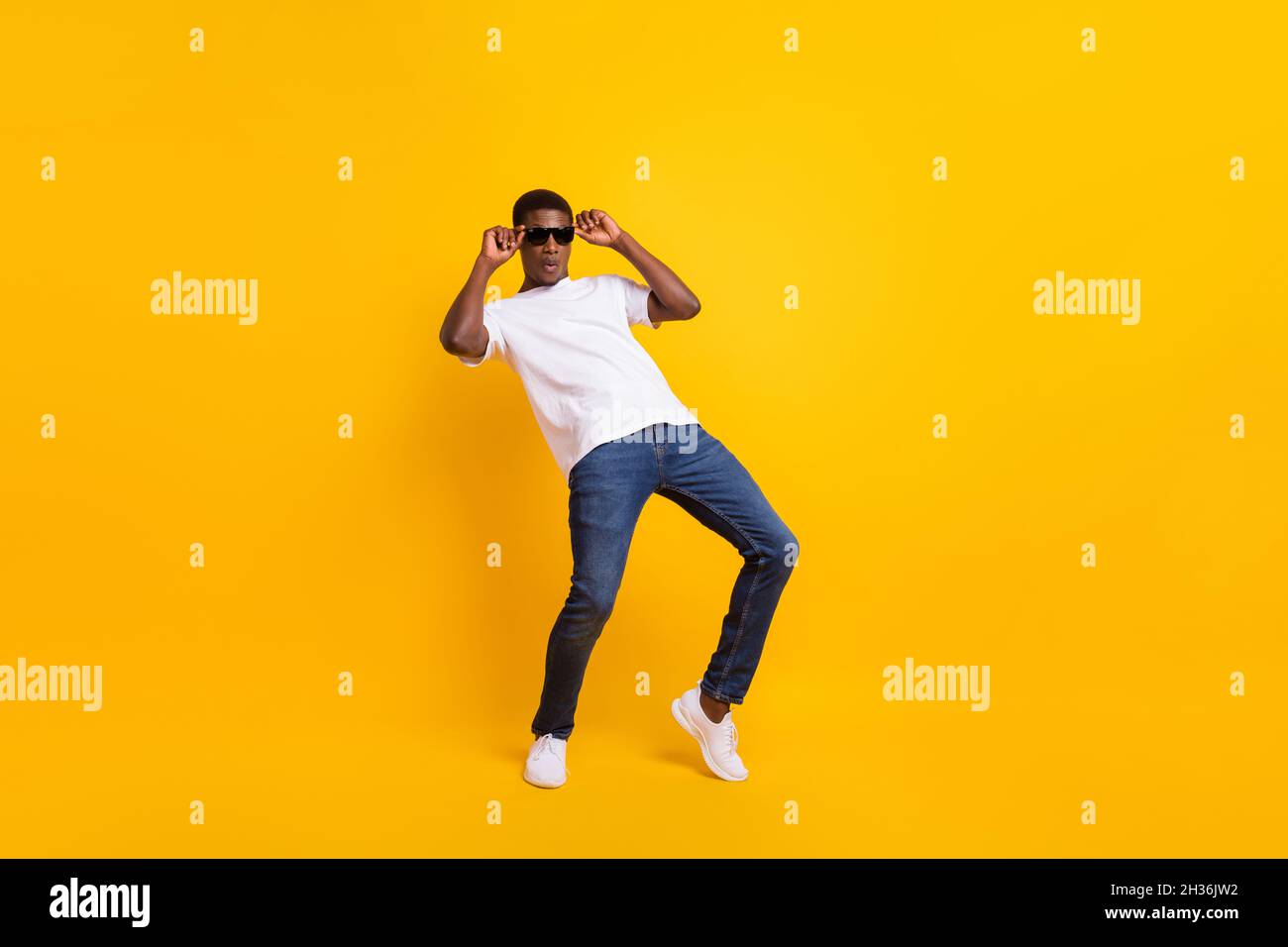 Full length body size view of attractive funky guy dancing having fun ...