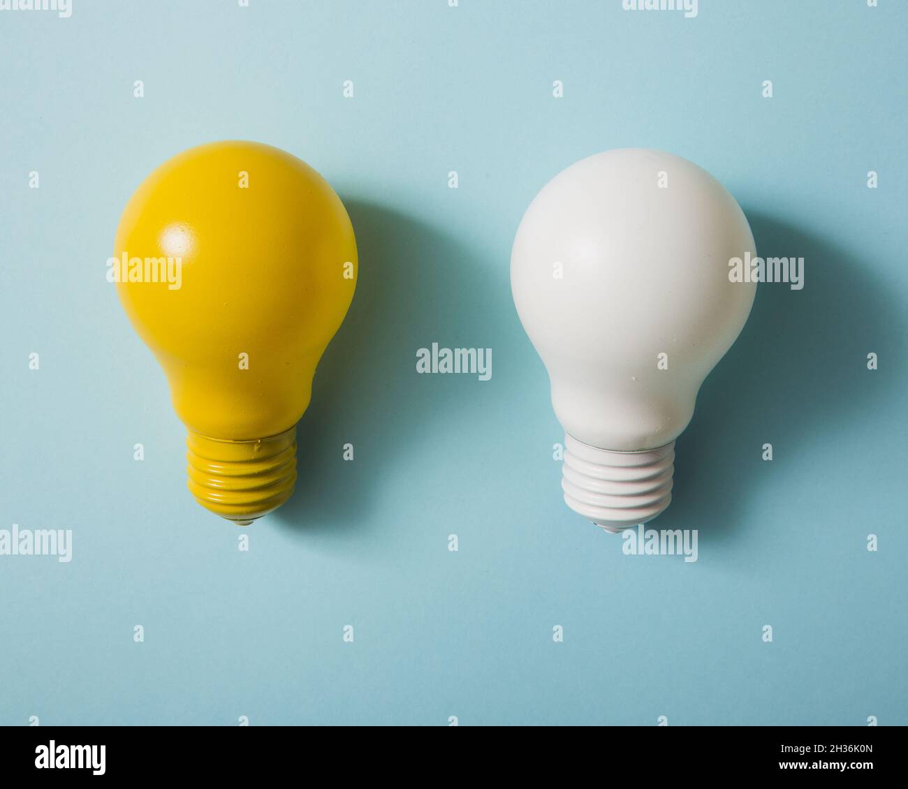 yellow white light bulb blue background. Resolution and high quality ...