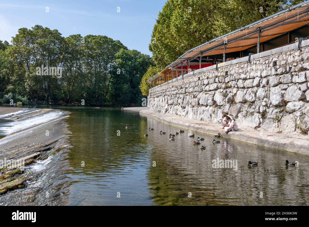 The Hérault river borders the quaint medieval village of Laroque in the ...