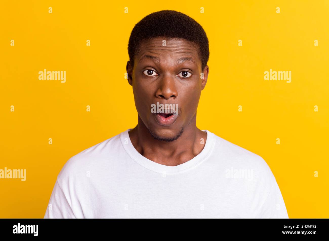 Portrait of attractive amazed stunned guy pout lips news reaction ...