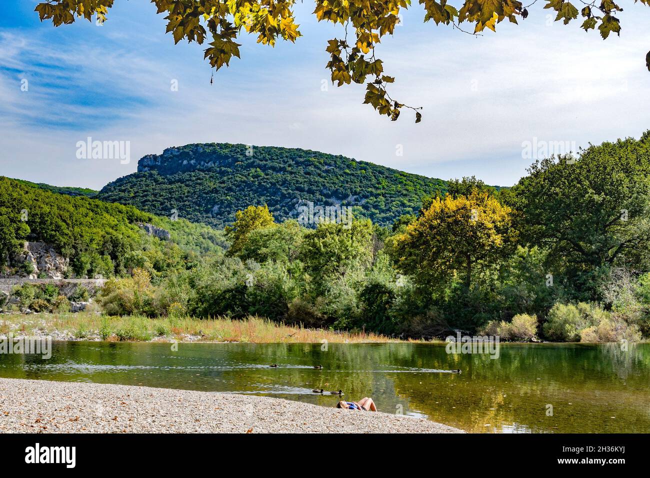 The Hérault river borders the quaint medieval village of Laroque in the ...