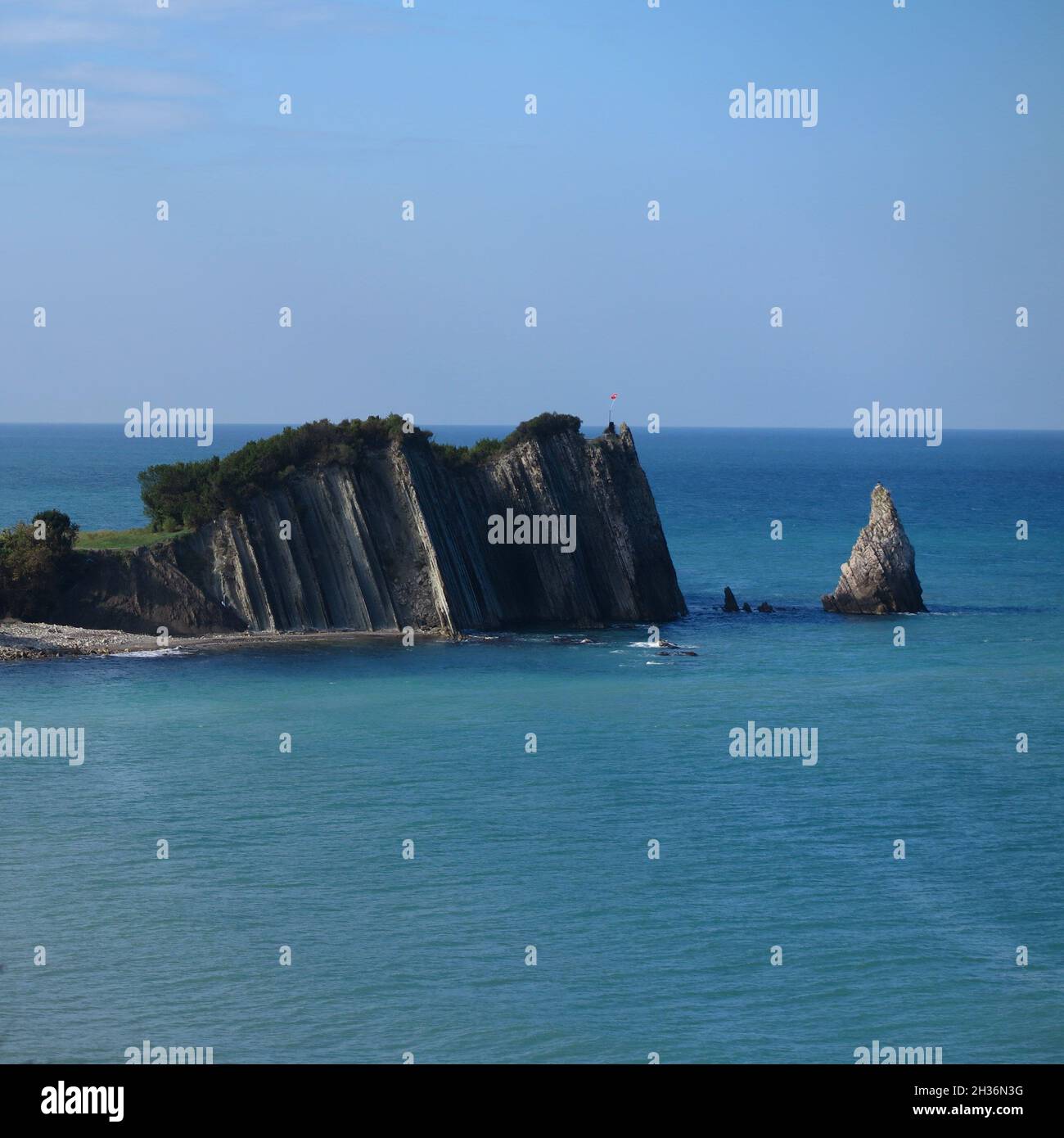 cliffs in the middle of the sea Stock Photo - Alamy
