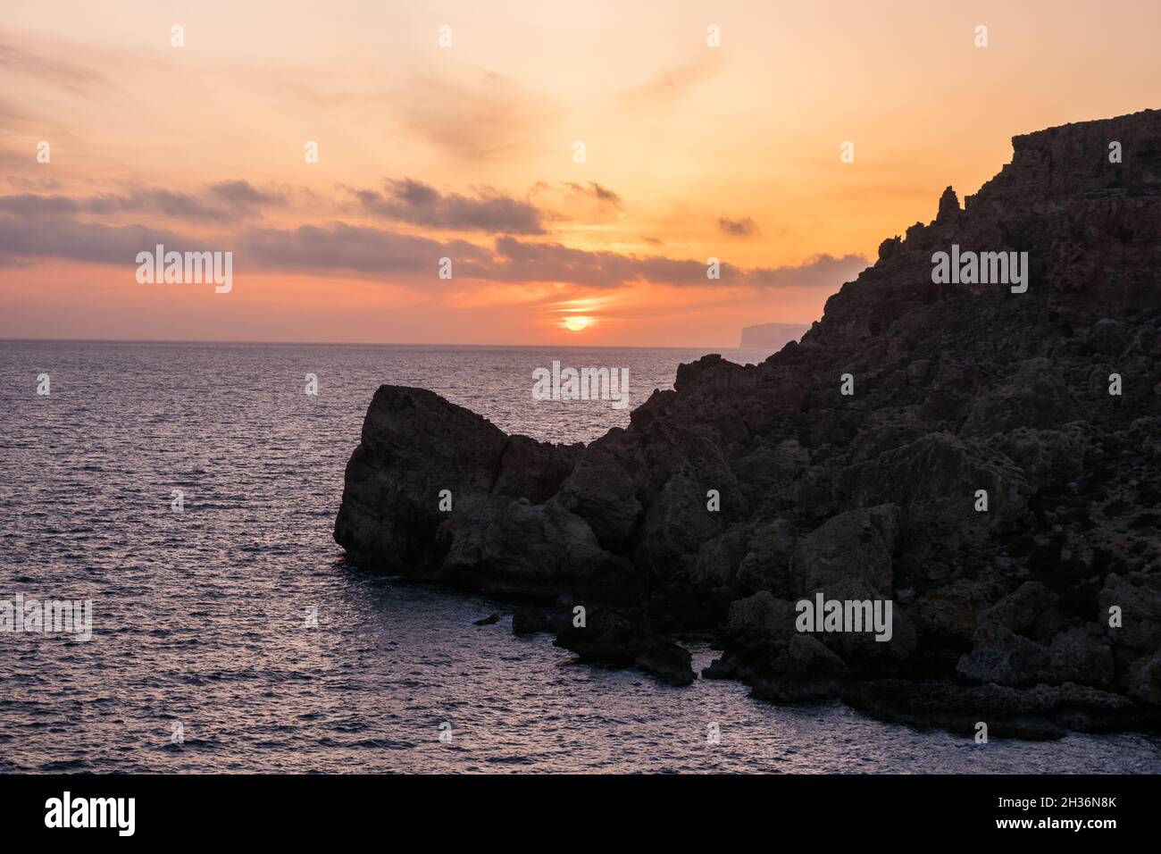 Sunset on a beautiful spring day with calm sea, seen from Anchor Bay ...