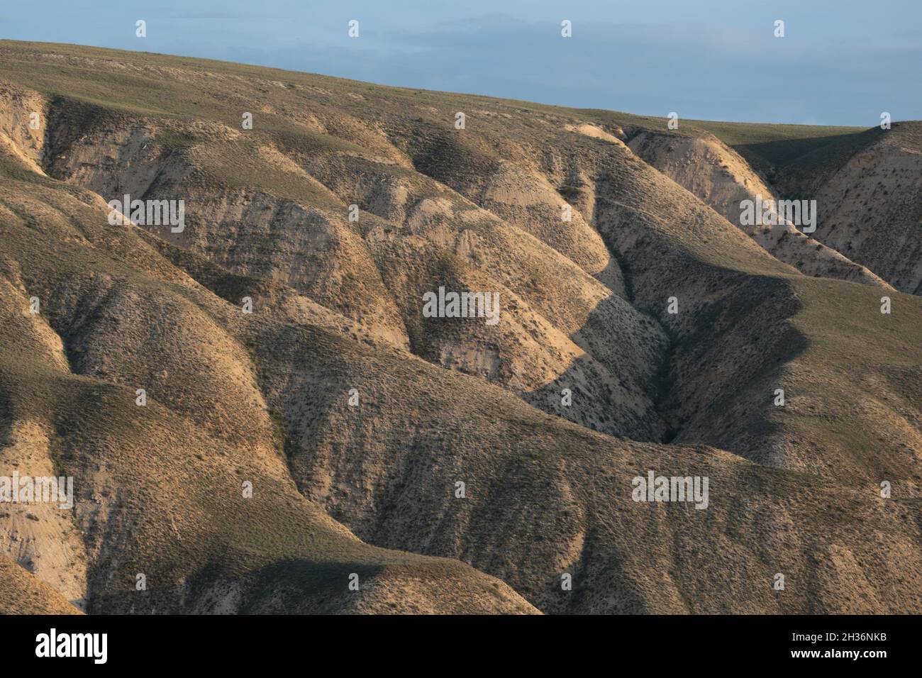 Mountain slope with rugged landforms Stock Photo - Alamy