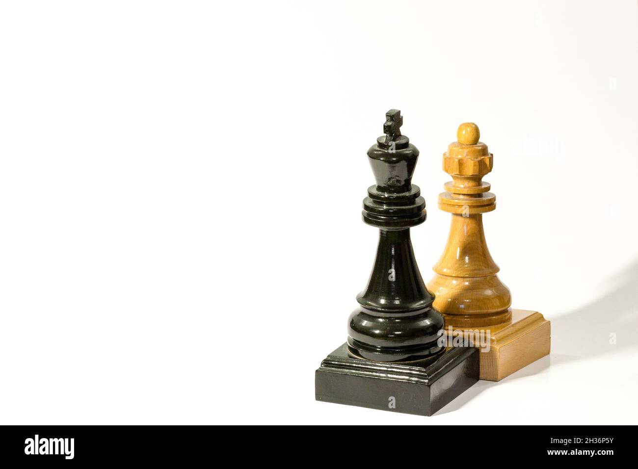 Chess figures on table Stock Photo - Alamy