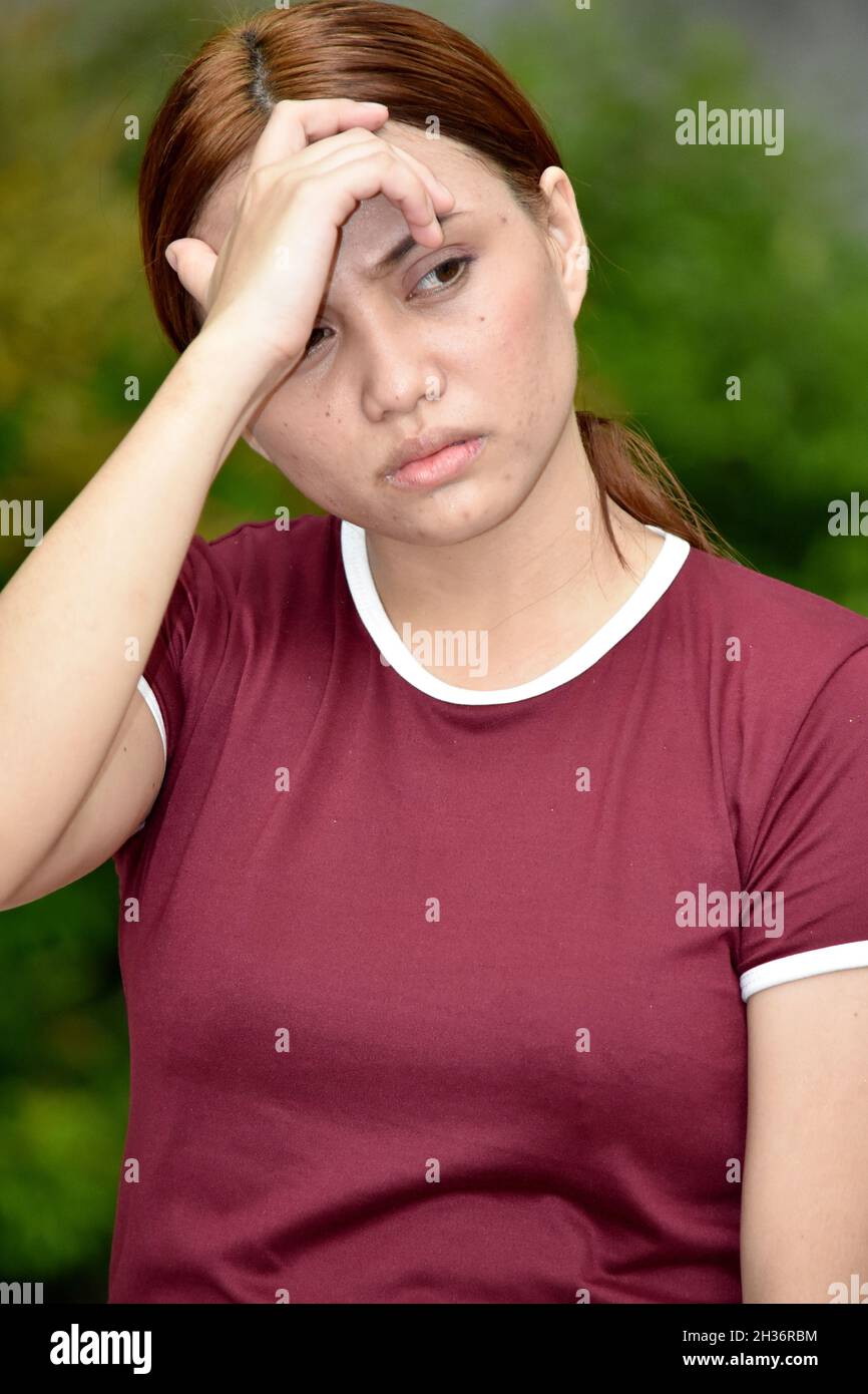An Adult Female And Sadness Stock Photo - Alamy