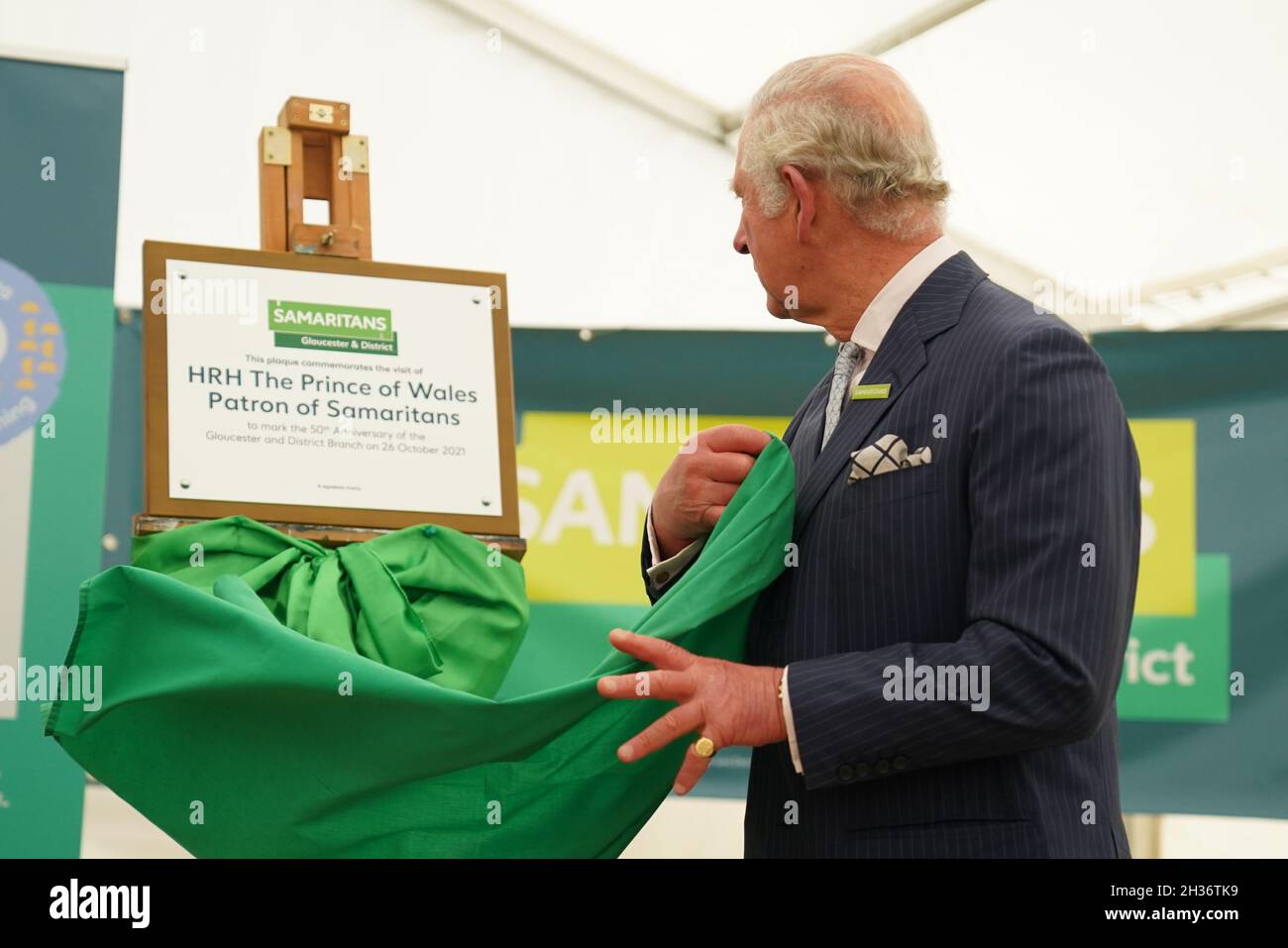 The Prince of Wales, Patron of Samaritans, unveiling a plaque during a ...