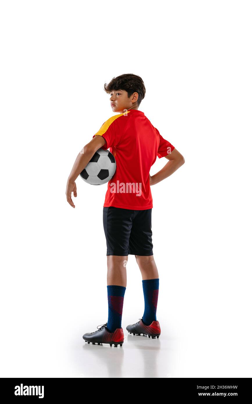 Full-length side view portrait of young boy, teenager, professional ...