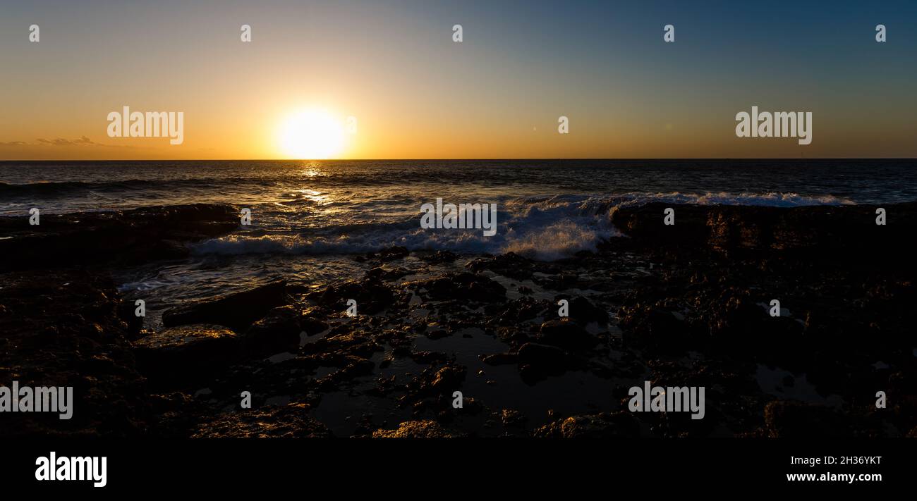 quiet sea coast with stones at the twilight, natural sea background ...