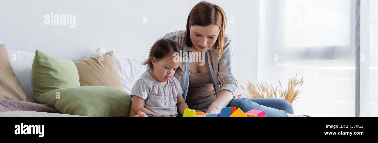 Child down syndrome blocks hi-res stock photography and images - Alamy
