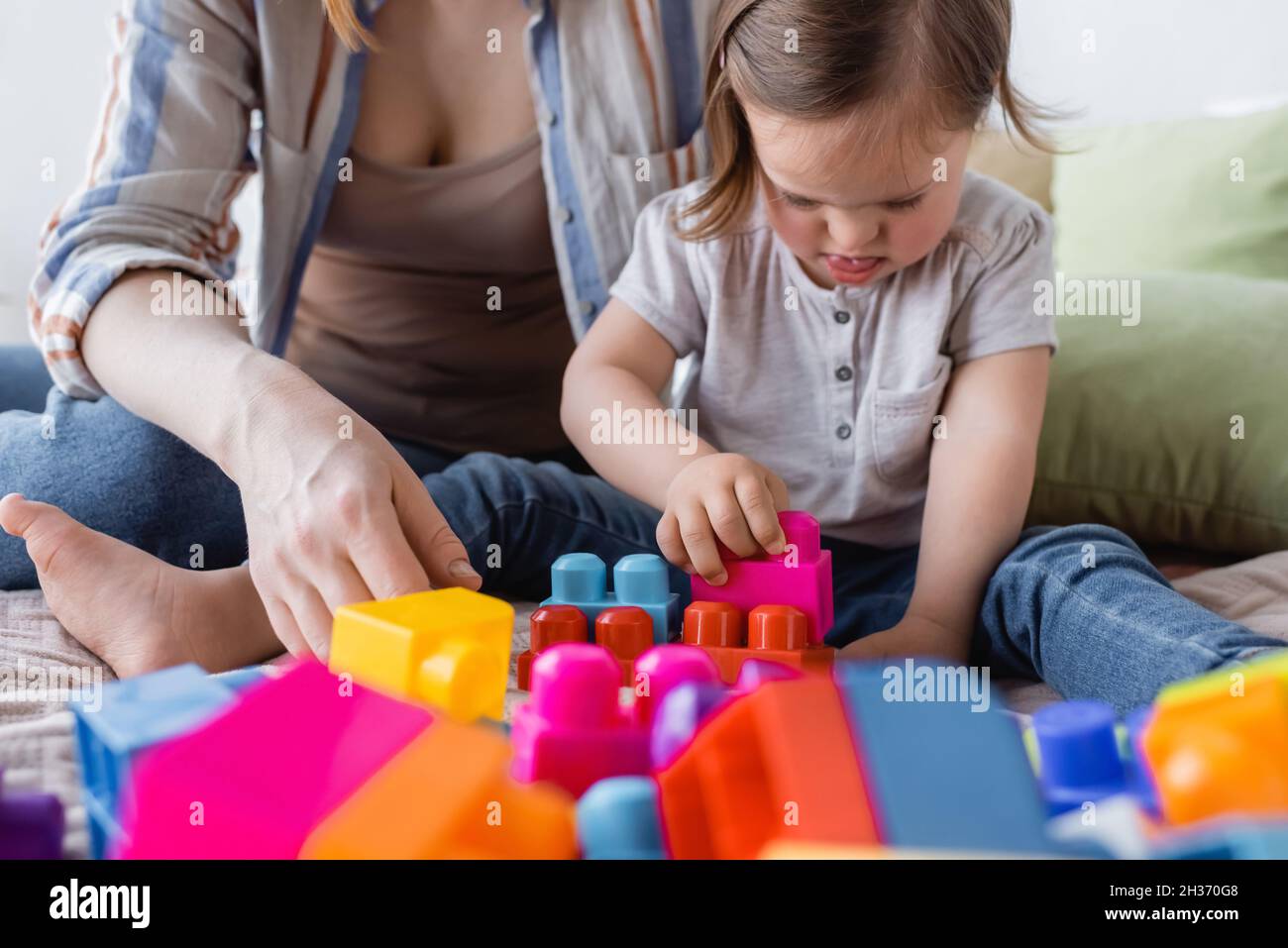 Child down syndrome blocks hi-res stock photography and images - Alamy