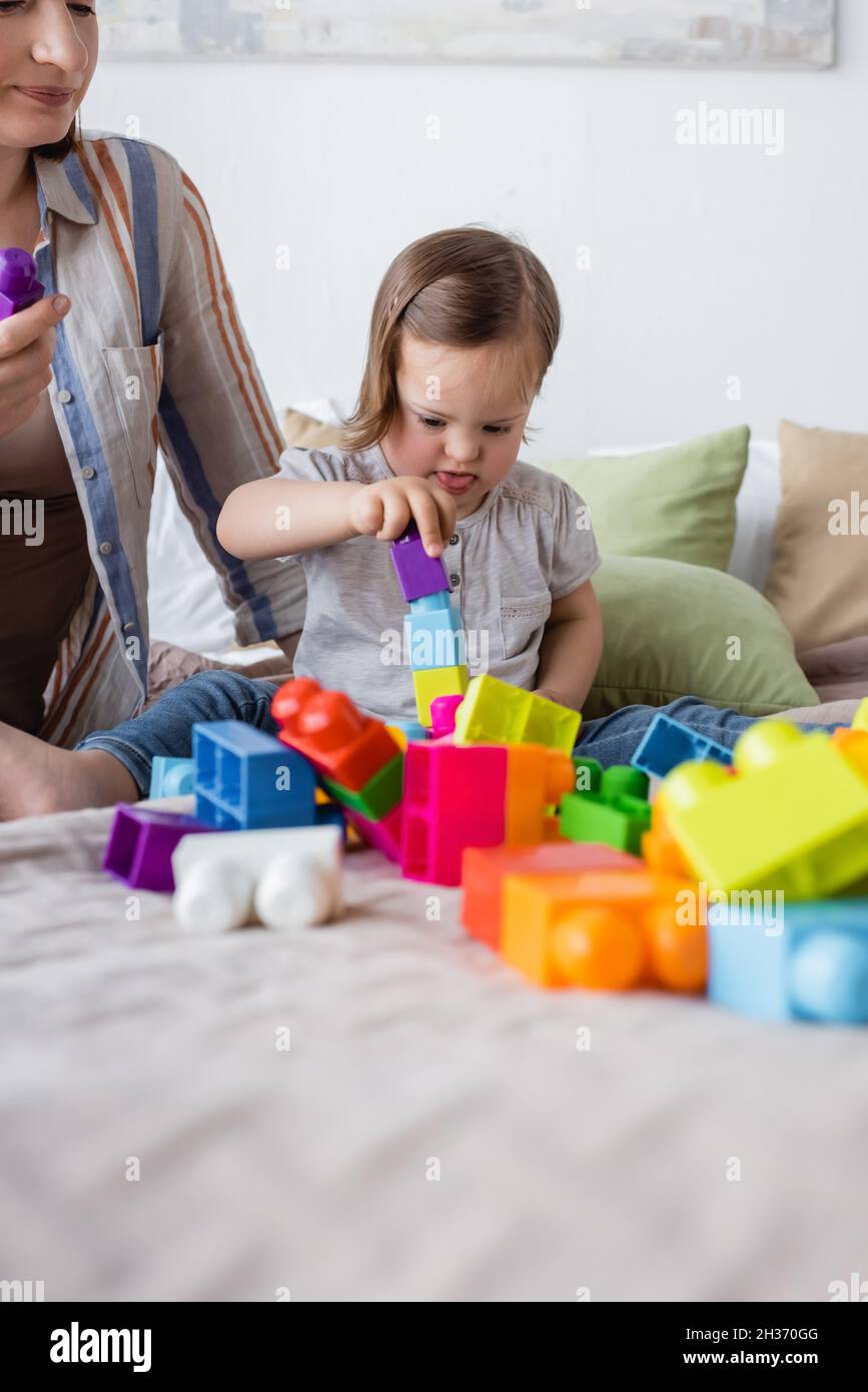 Child down syndrome blocks hi-res stock photography and images - Alamy