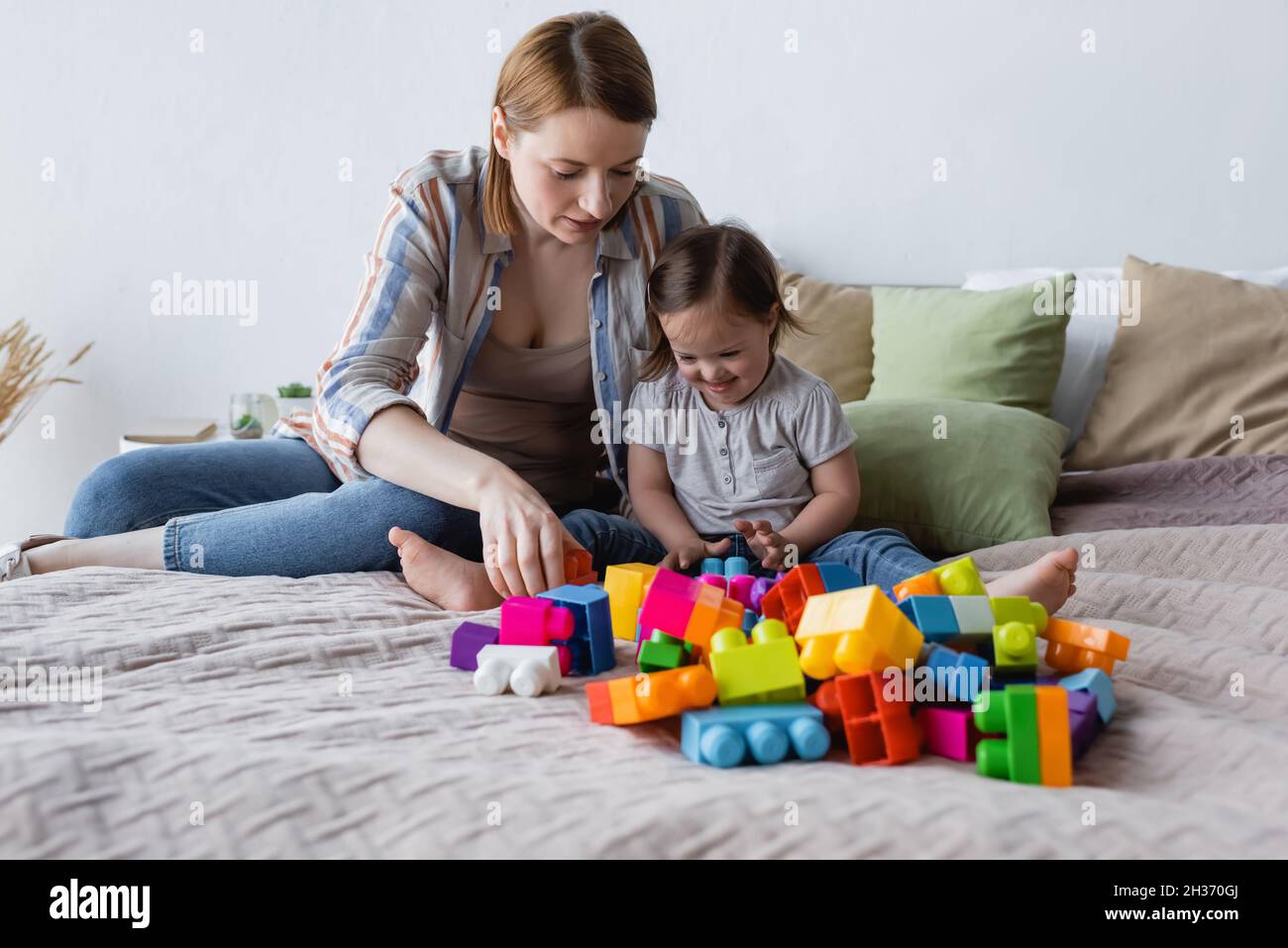 Child down syndrome blocks hi-res stock photography and images - Alamy
