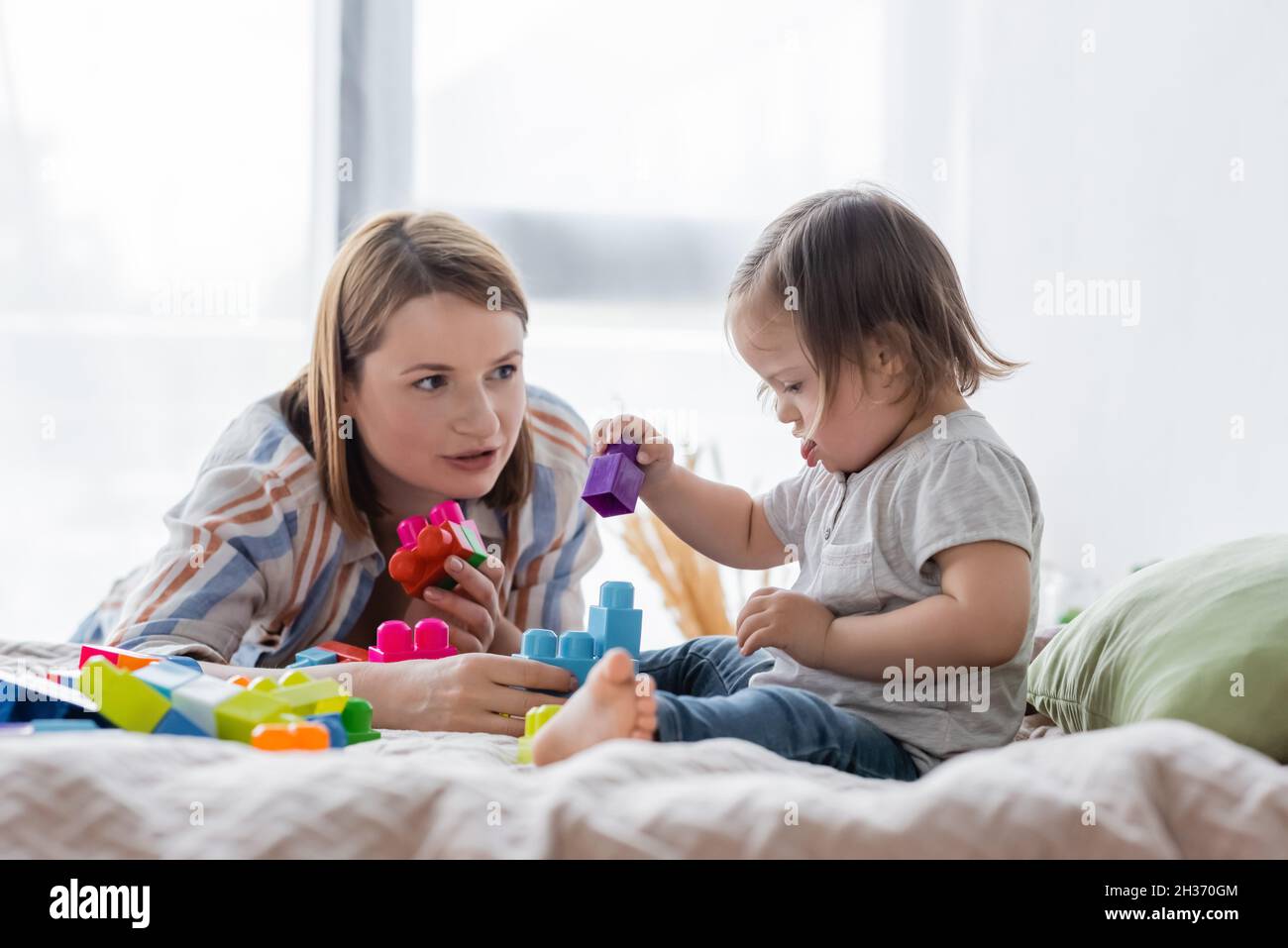 Child down syndrome blocks hi-res stock photography and images - Alamy