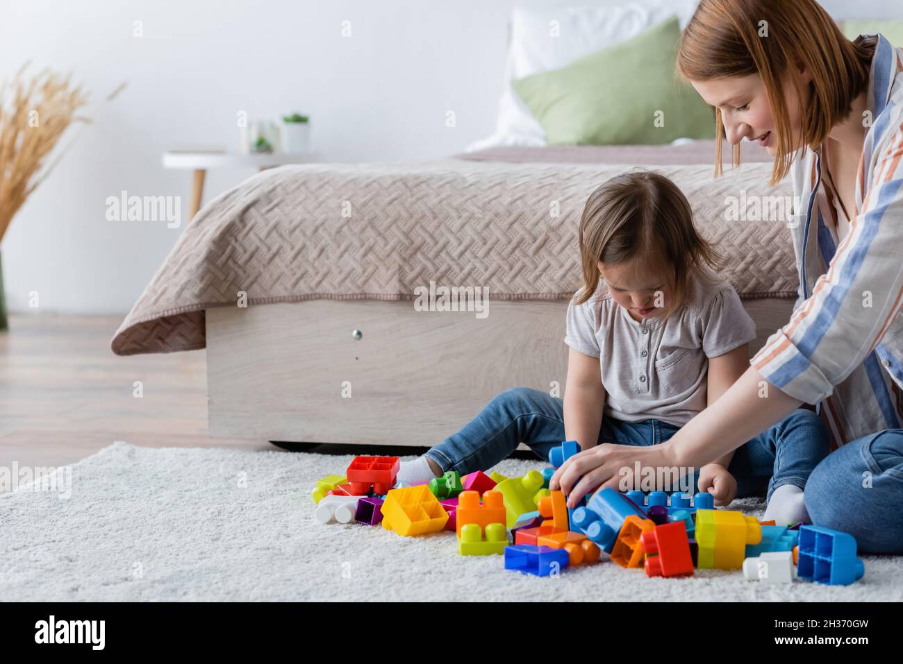 Child down syndrome blocks hi-res stock photography and images - Alamy