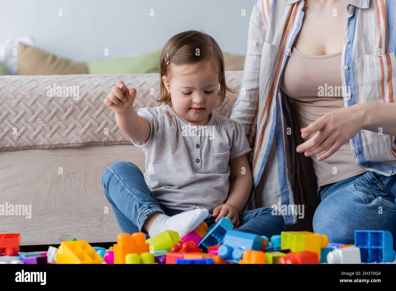 Child down syndrome blocks hi-res stock photography and images - Alamy