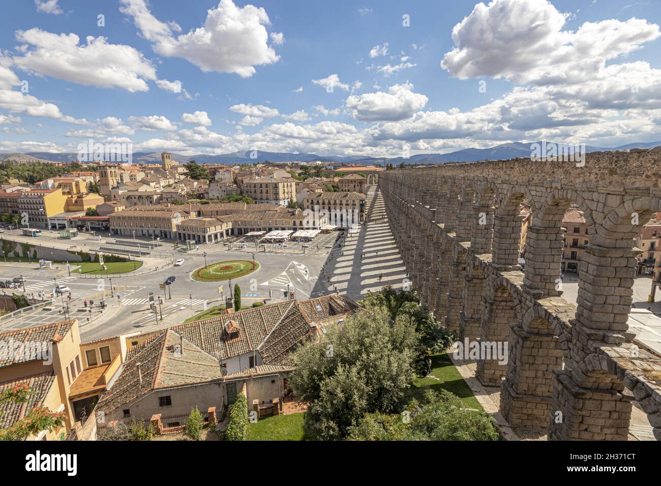 Aerial view of the Old City and the Aqueduct of Segovia in Spain during ...